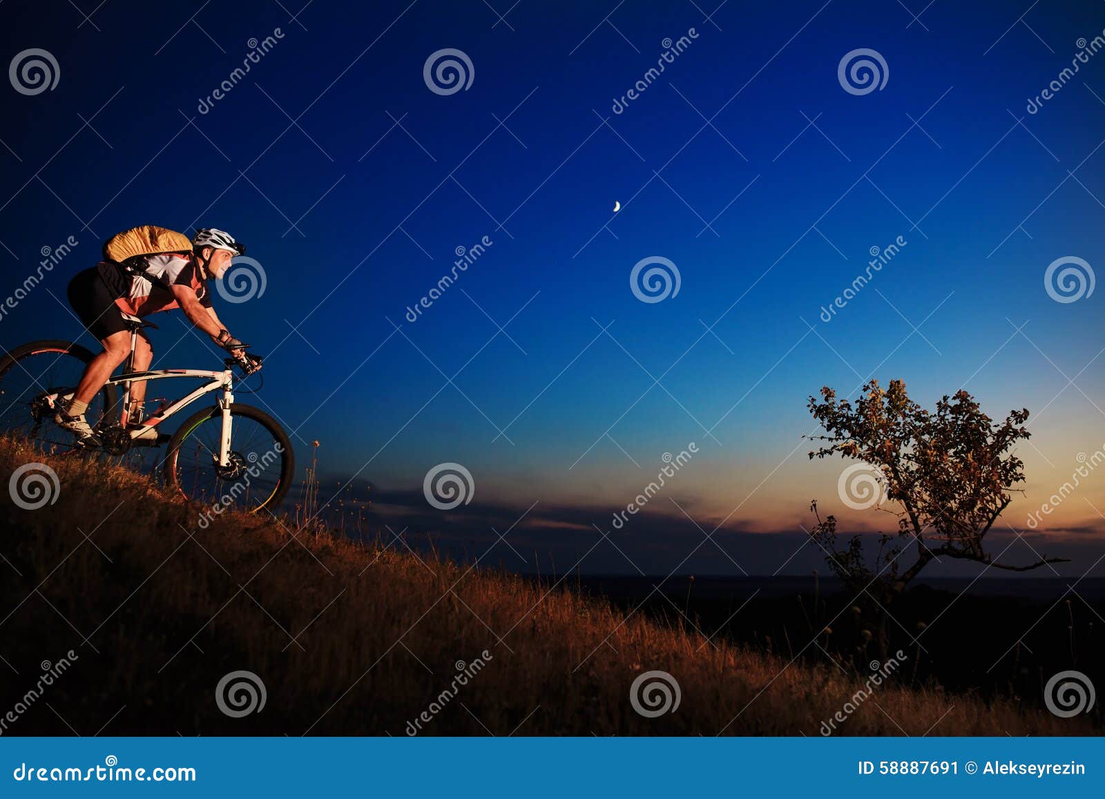 Biker and Bicycle on Sunset Background. Stock Image - Image of activity ...