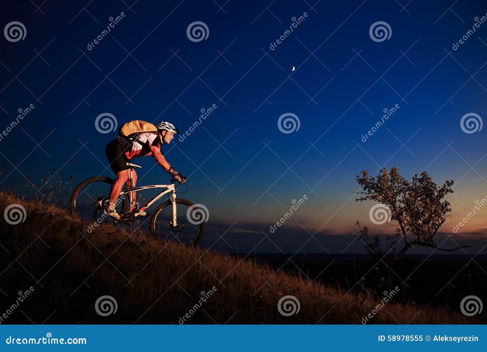 Biker and Bicycle on Sunset Background. Stock Image - Image of bicycle ...