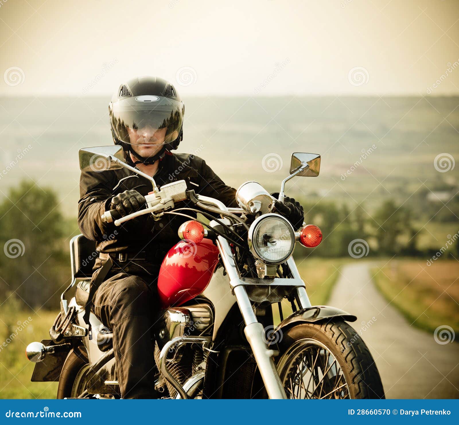Biker on the country road stock photo. Image of retro - 28660570