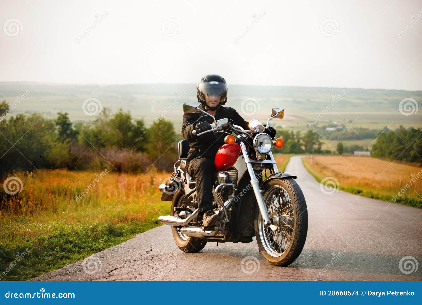 Biker on the country road stock photo. Image of adult - 28660574