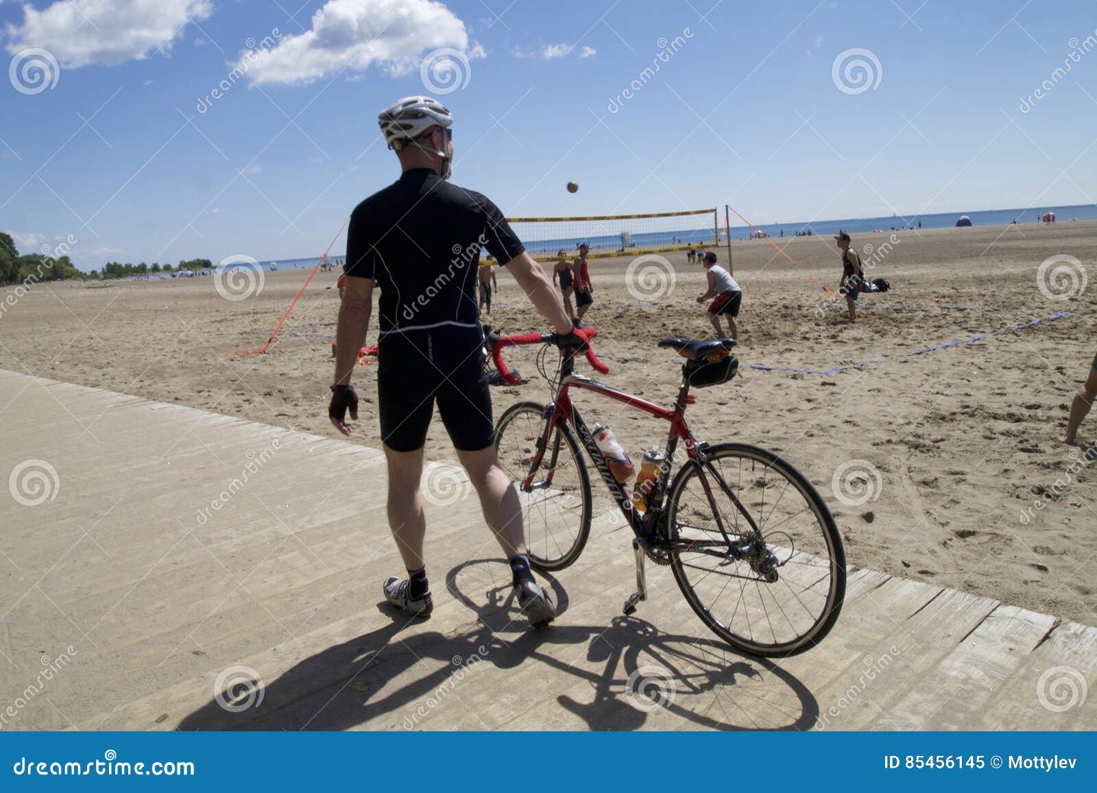 Biker at the front beach editorial image. Image of streetshared - 85456145