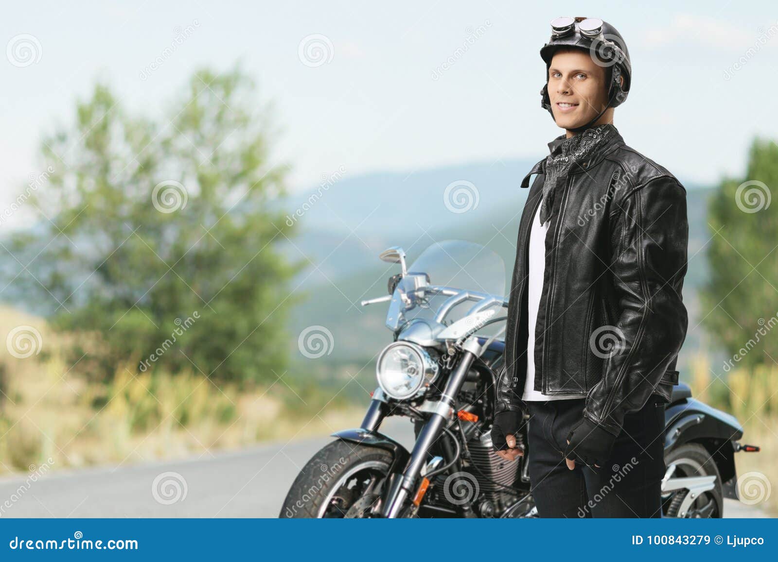 Biker in Front of a Motorcycle Looking at the Camera Stock Image ...