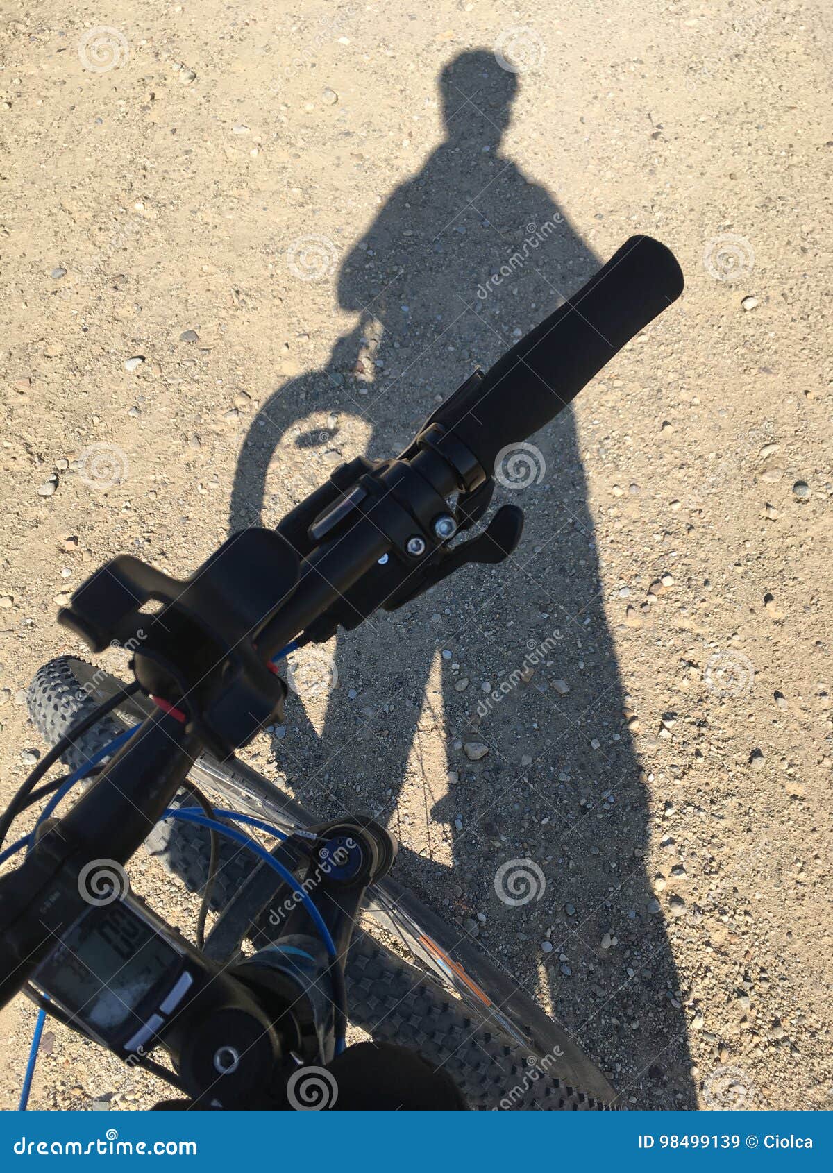 Biker and his shadow stock image. Image of blur, blurring - 98499139