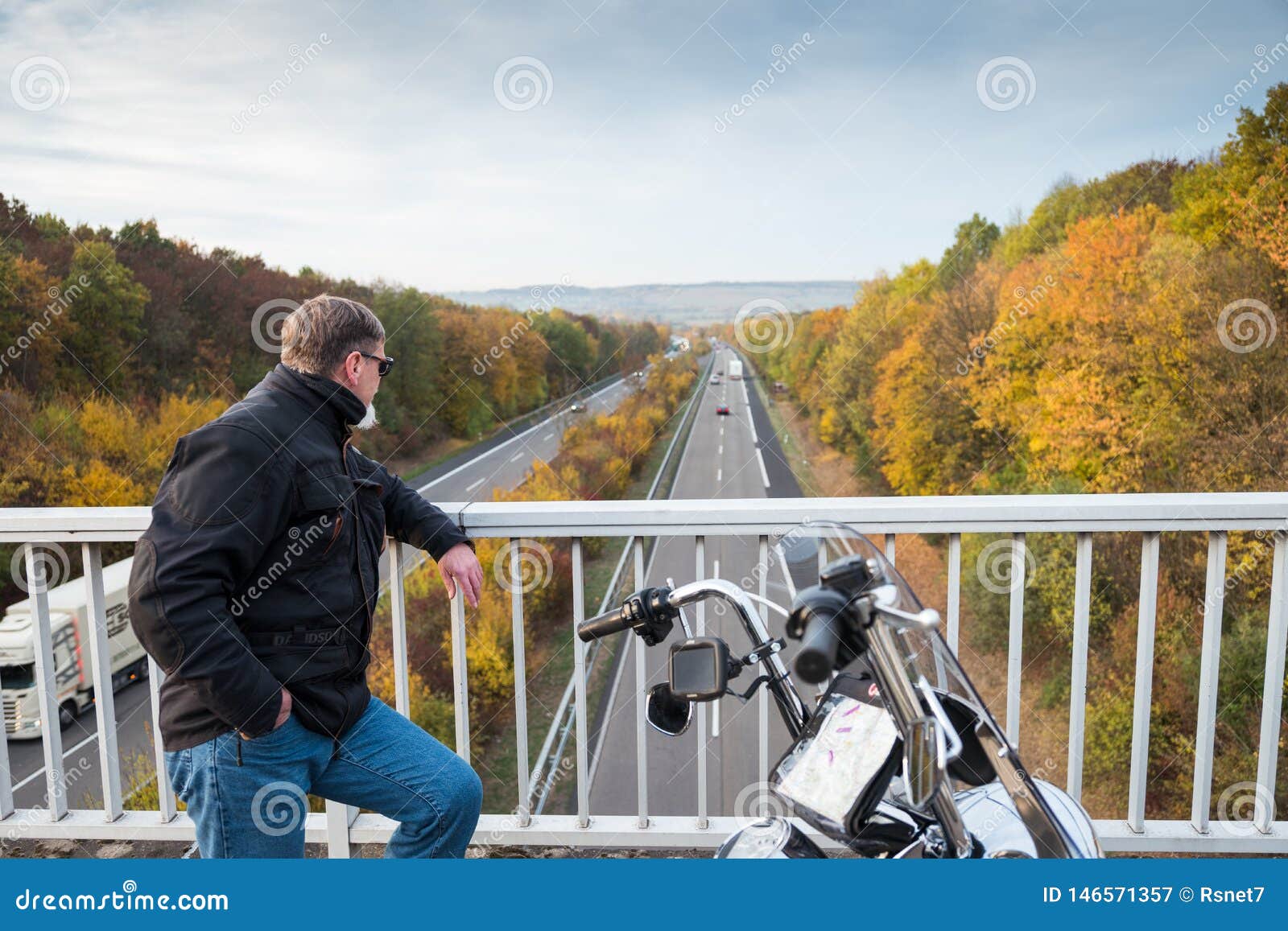 Biker with Motorcycle Looks on Highway Editorial Photography - Image of ...