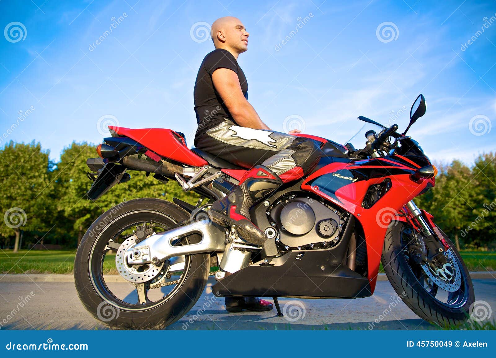 Biker on a motorcycle stock image. Image of sport, road - 45750049