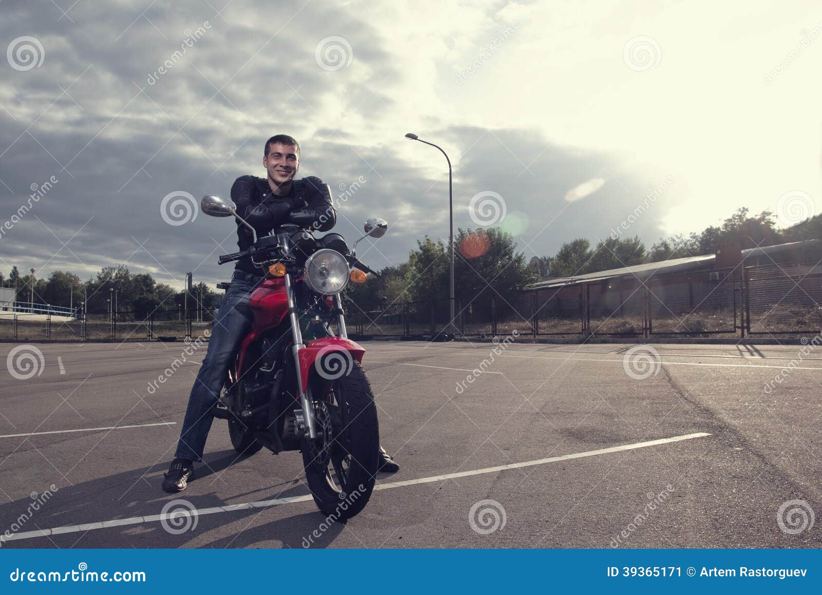 Biker posing on motorbike stock image. Image of happy - 39365171