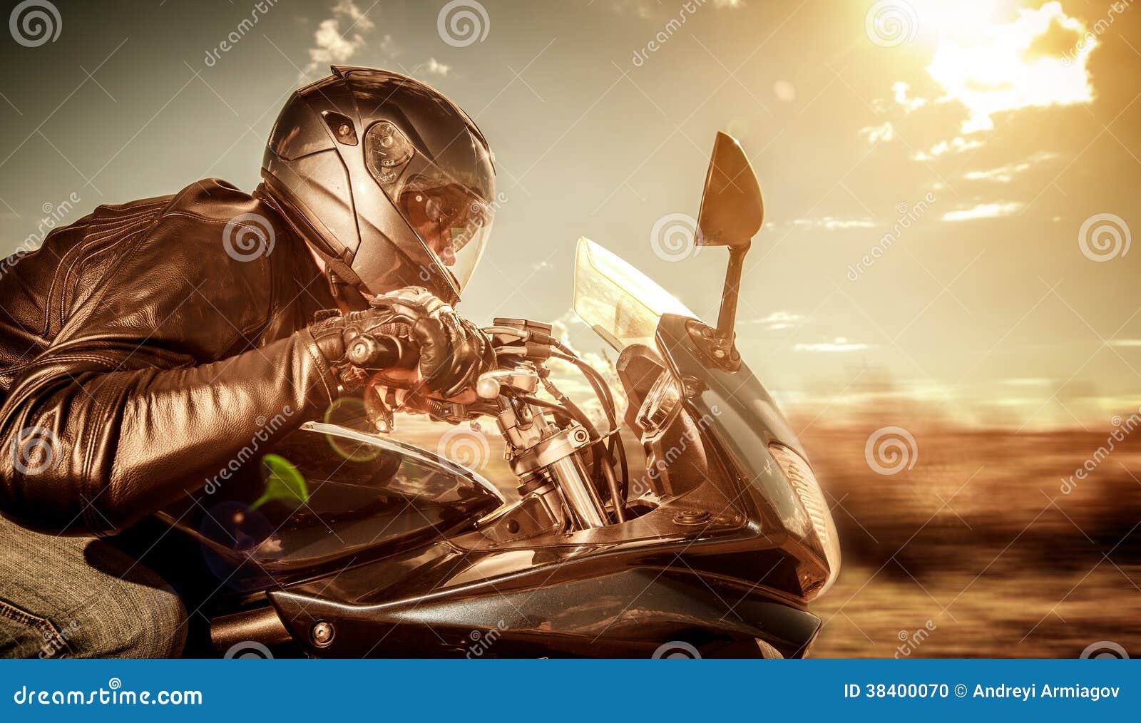 Biker racing on the road stock photo. Image of person - 38400070