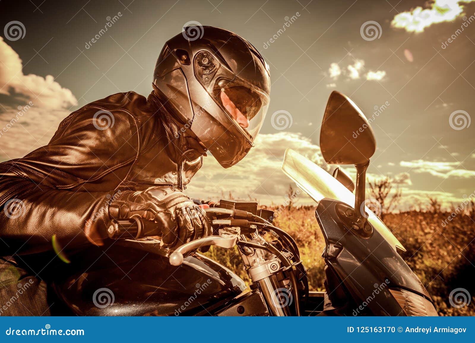 Biker racing on the road stock photo. Image of fisheye - 125163170