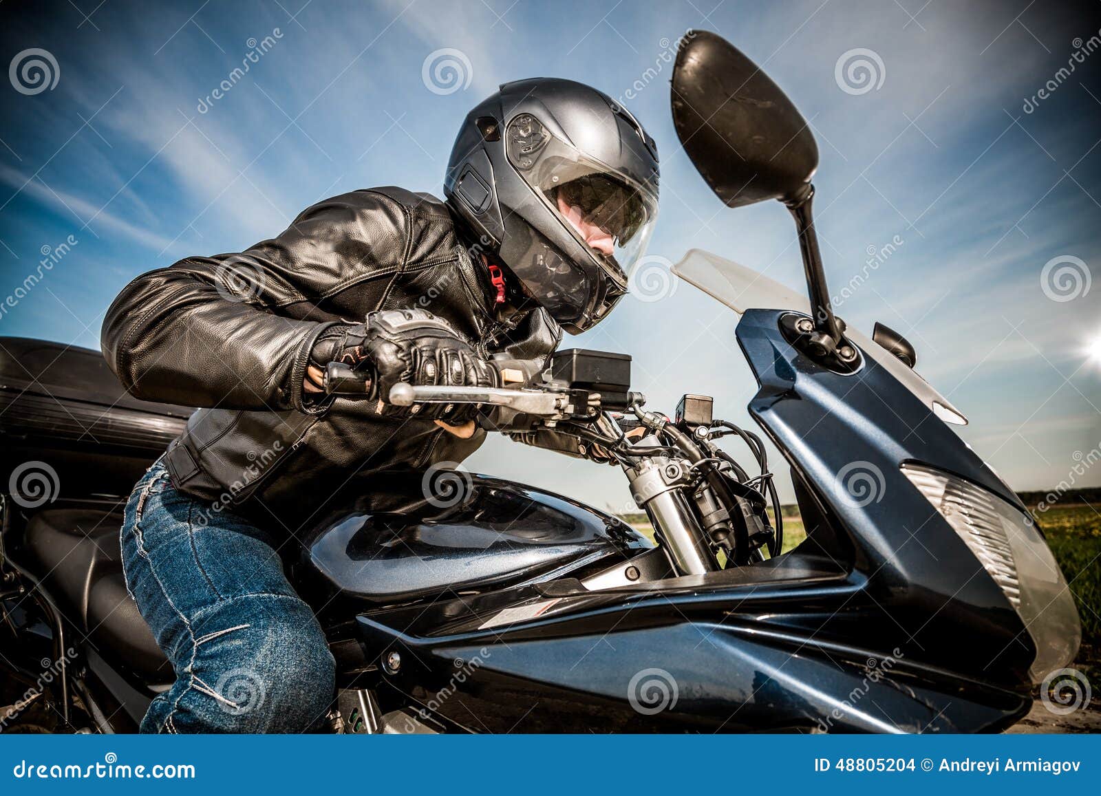 Biker racing on the road stock photo. Image of person - 48805204