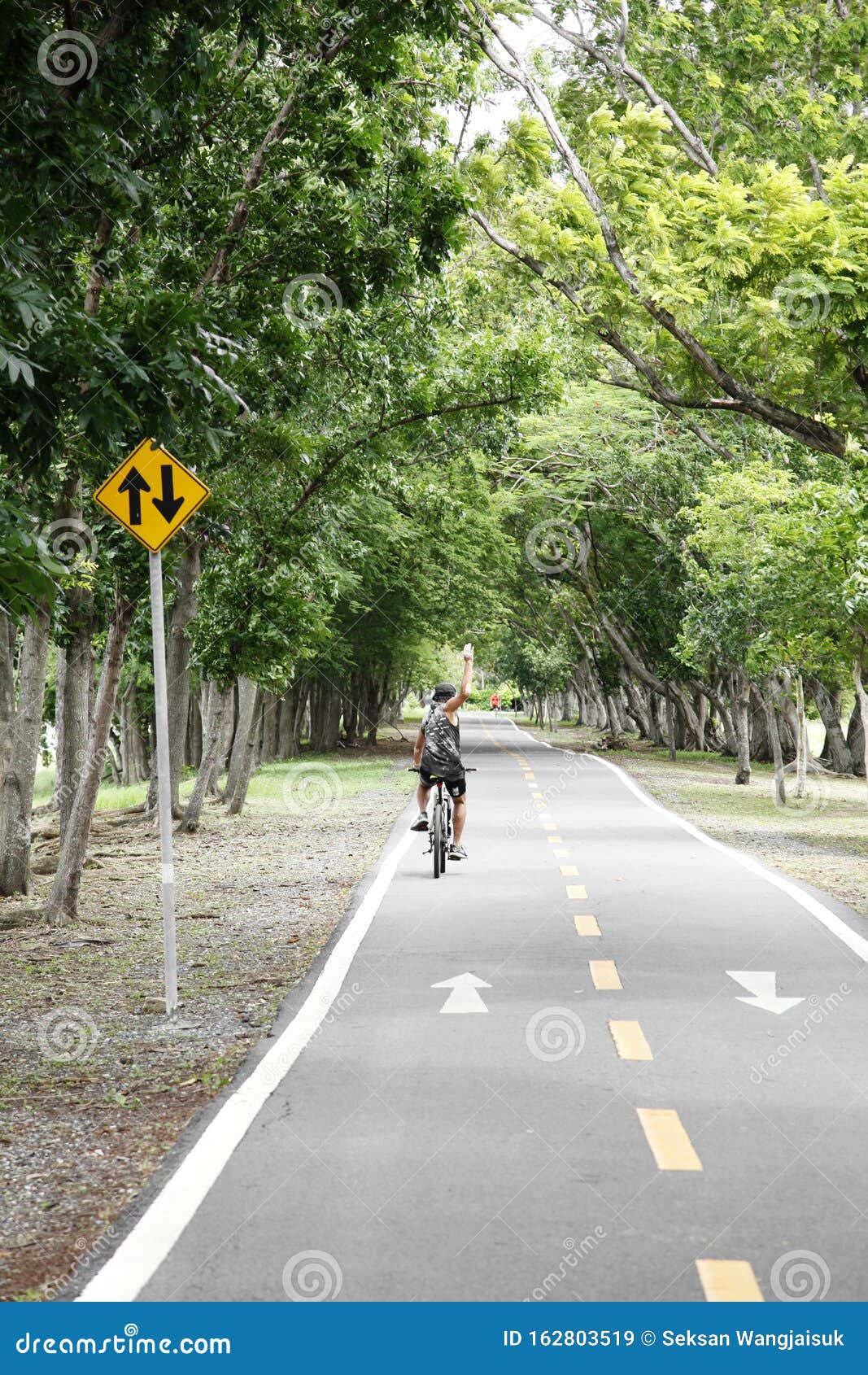 Biker Riding on Cycling Road Stock Image - Image of park, autumn: 162803519