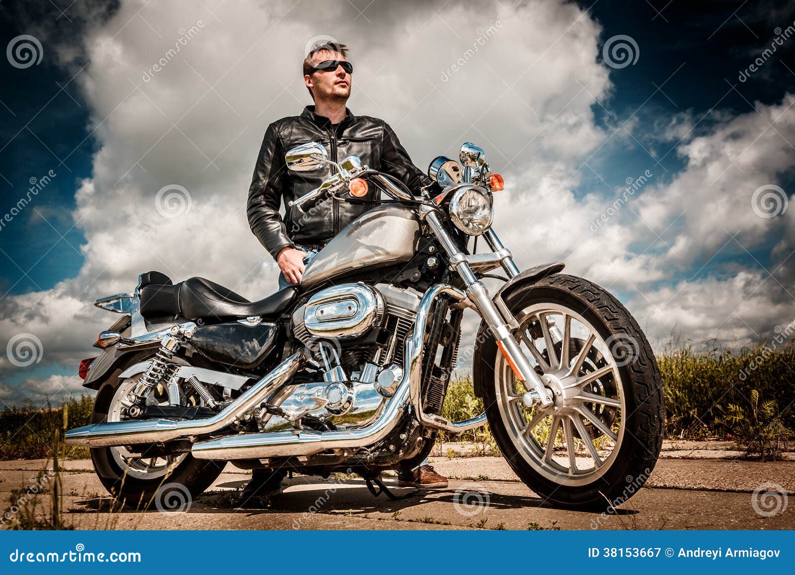 Biker on the road stock image. Image of fresco, jeans - 38153667