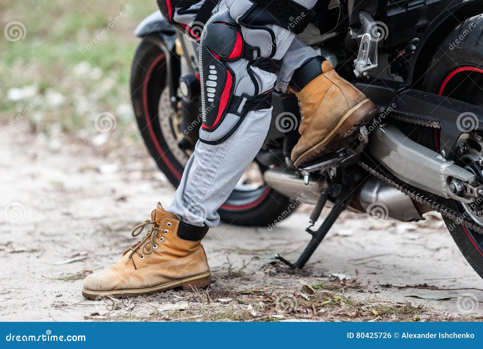 Biker Sitting on Motorcycle, Close-up View on Legs. Stock Photo - Image ...