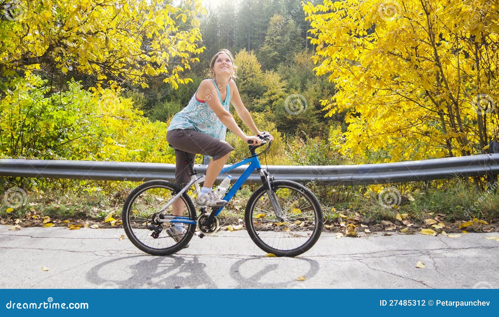 Biking in autumn stock photo. Image of cycle, people - 27485312