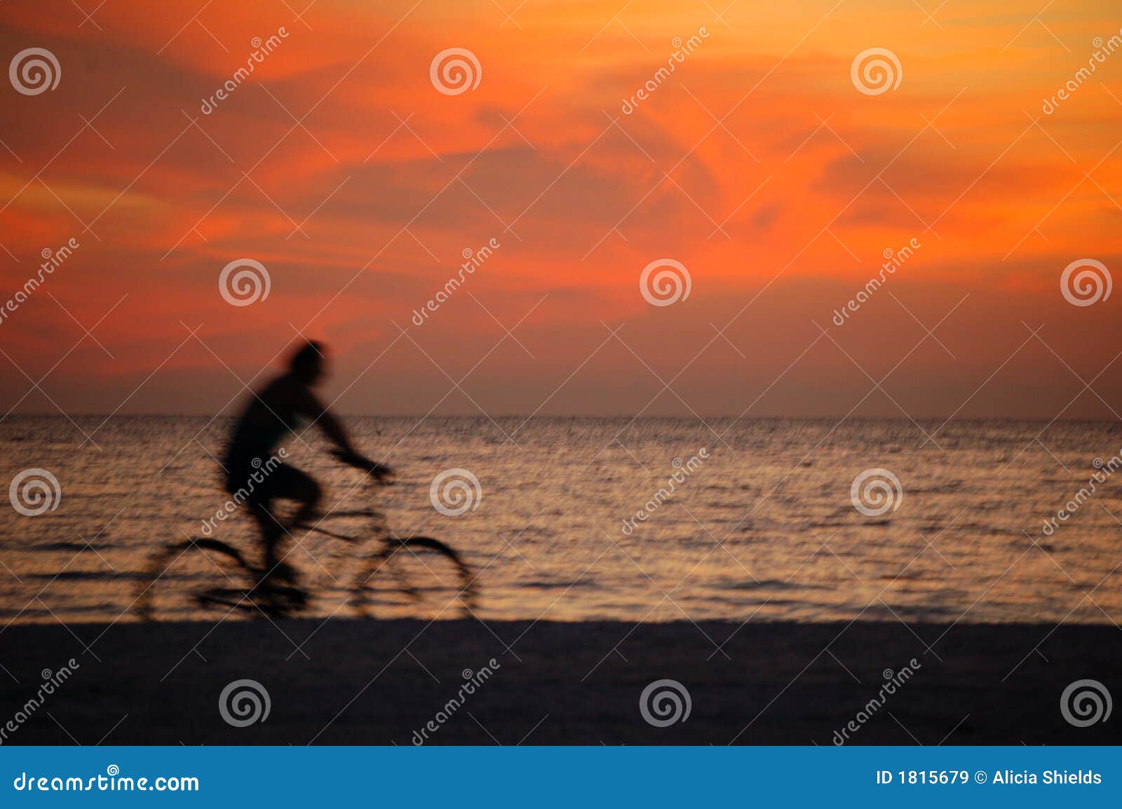 Biking at Sunset stock image. Image of sand, person, tropical - 1815679