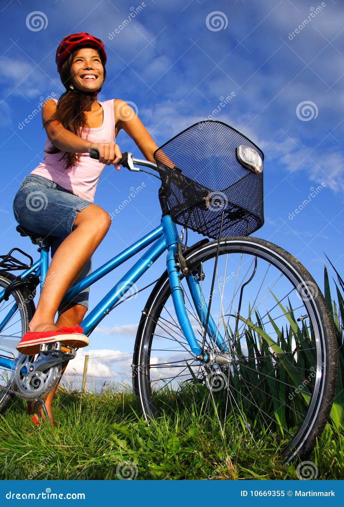 Biking woman stock image. Image of active, helmet, blue - 10669355