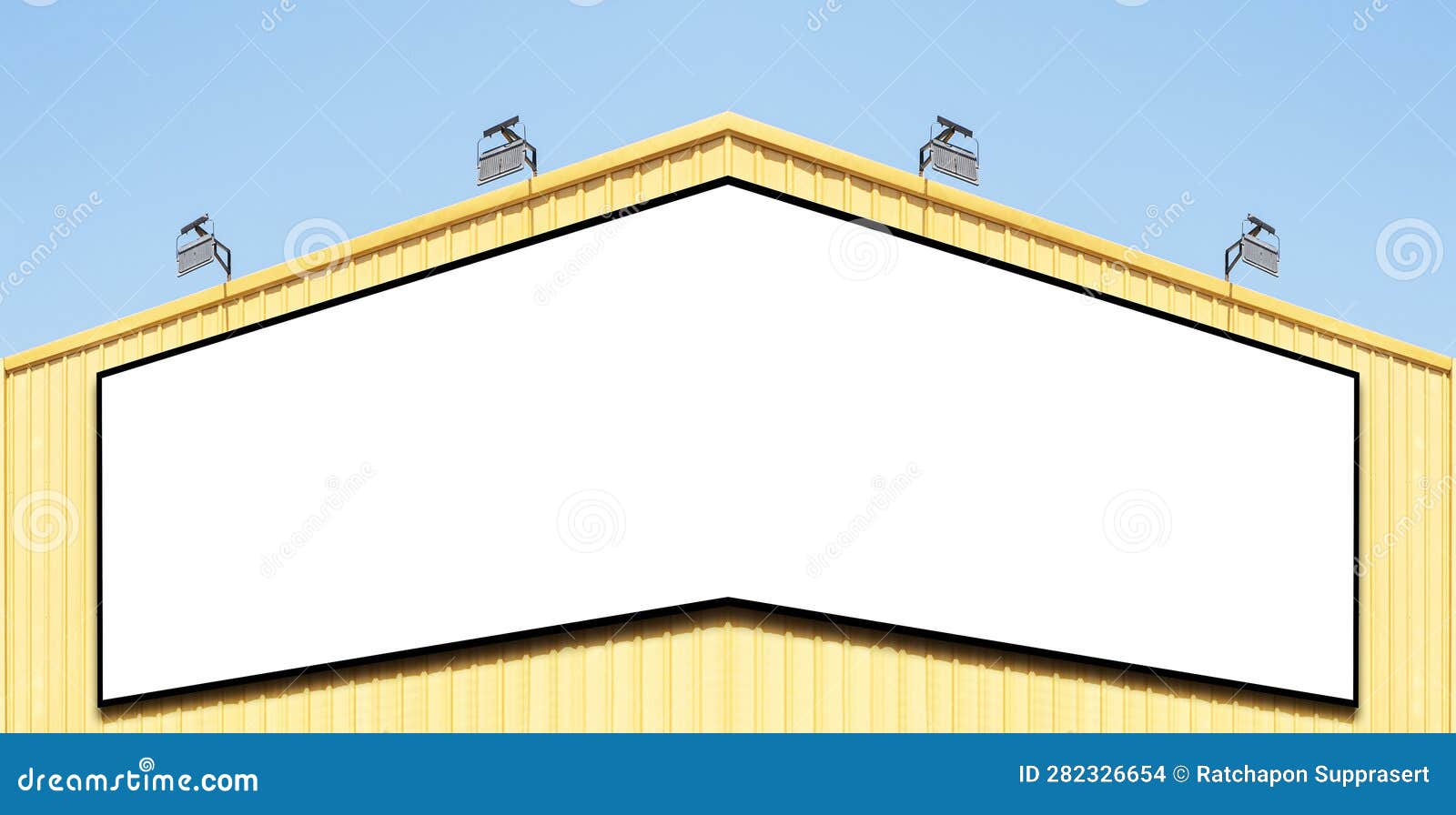 Billboard Corner on Yellow Building with Spot Light Stock Photo - Image ...