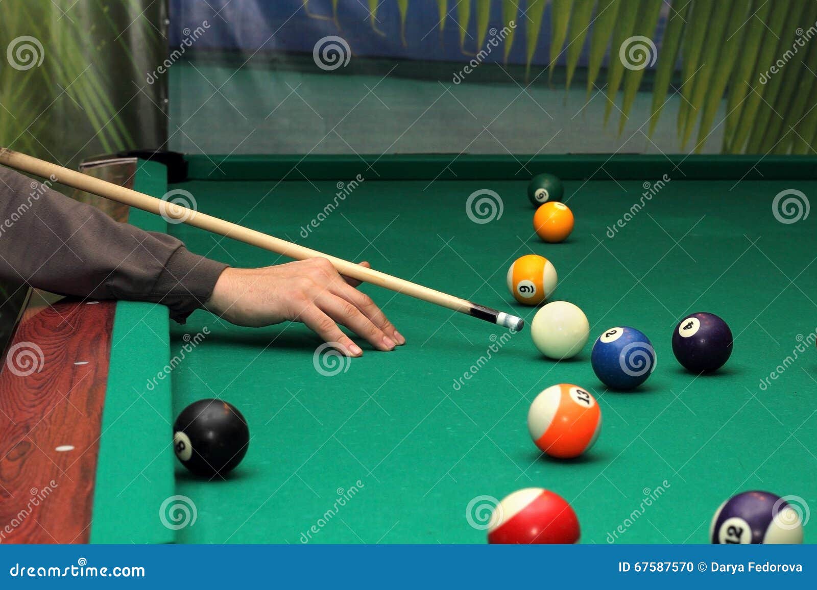 Billiard Balls on Green Table and Hand with Cue Stock Photo - Image of ...