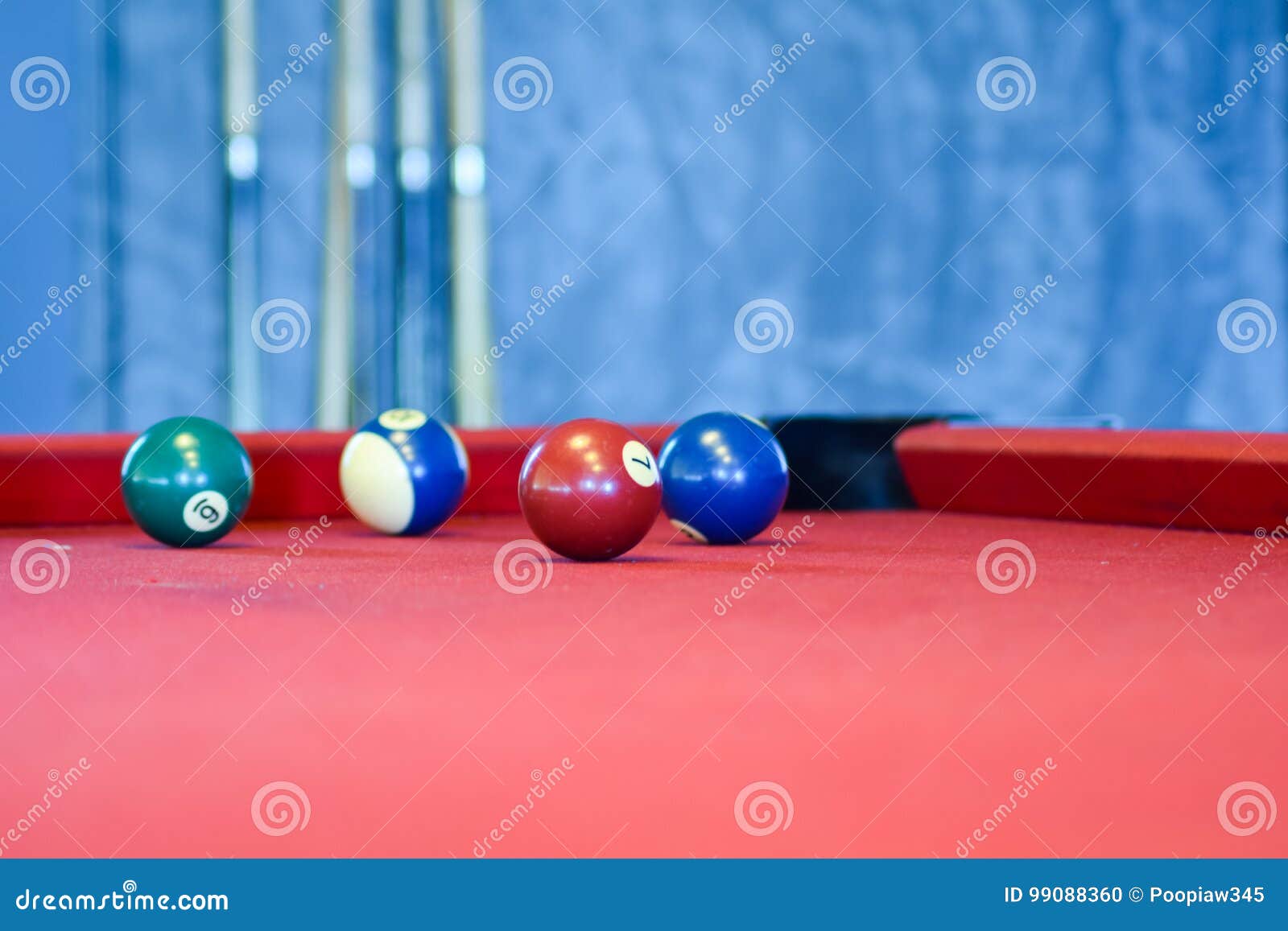 Billiard Balls on a Red Pool Table Stock Photo - Image of black, balls ...