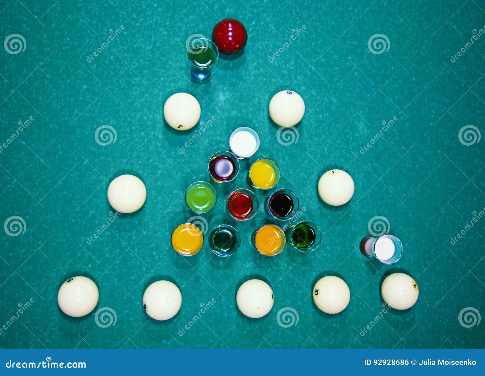 On a Billiard Table Stand with Coloured Glasses of Alcohol. Stock Photo ...