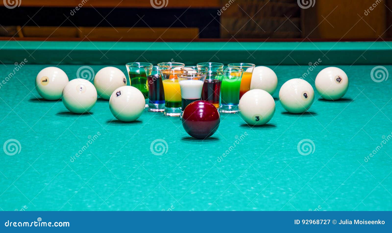 On a Billiard Table Stand with Coloured Glasses of Alcohol. Stock Image ...