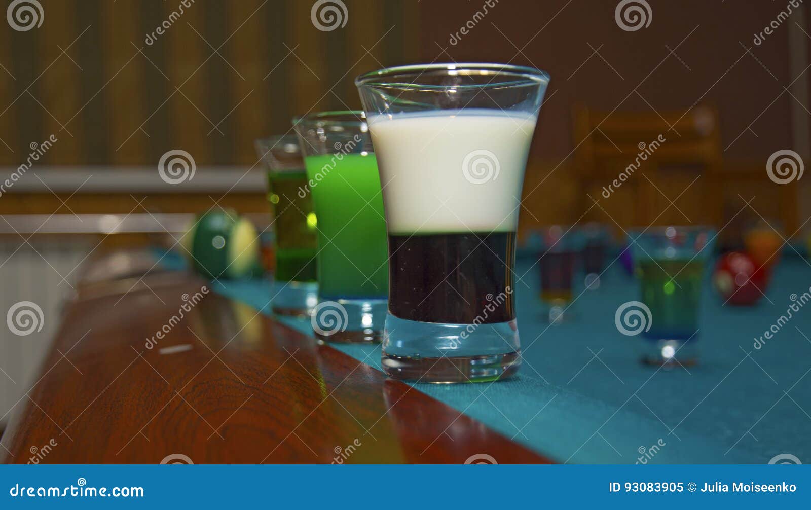 On a Billiard Table Stand with Coloured Glasses of Alcohol. Stock Image ...