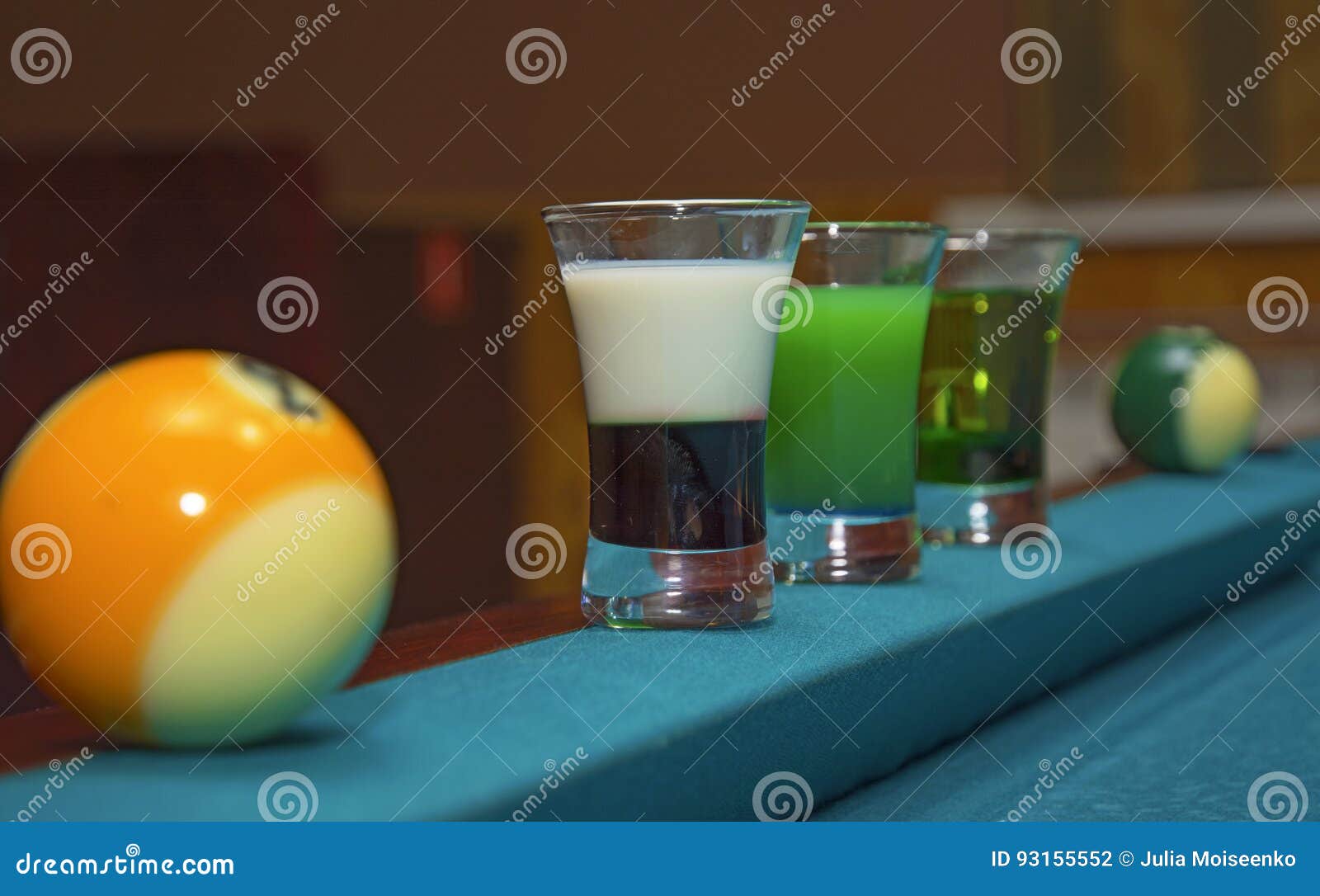 On a Billiard Table Stand with Coloured Glasses of Alcohol. Stock Photo ...