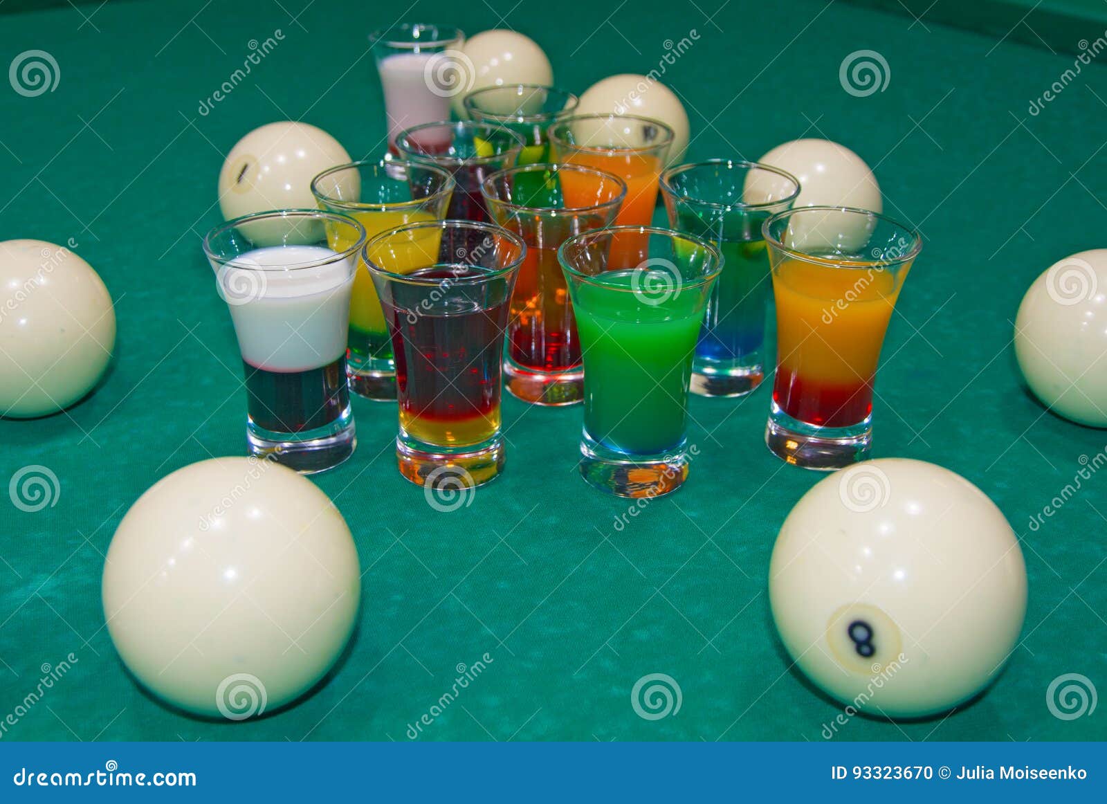 On a Billiard Table Stand with Coloured Glasses of Alcohol. Stock Photo ...