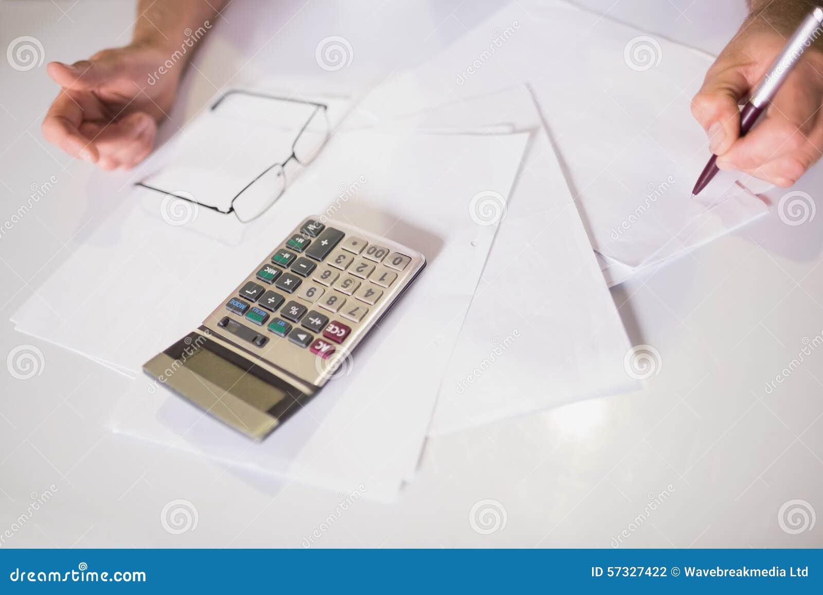 Bills and Calculator on Table Stock Photo - Image of desk, spectacles ...