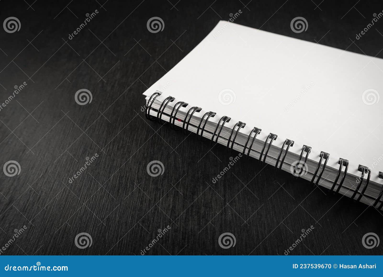 Binder Book with Plain White Paper on Black Table Stock Photo - Image ...