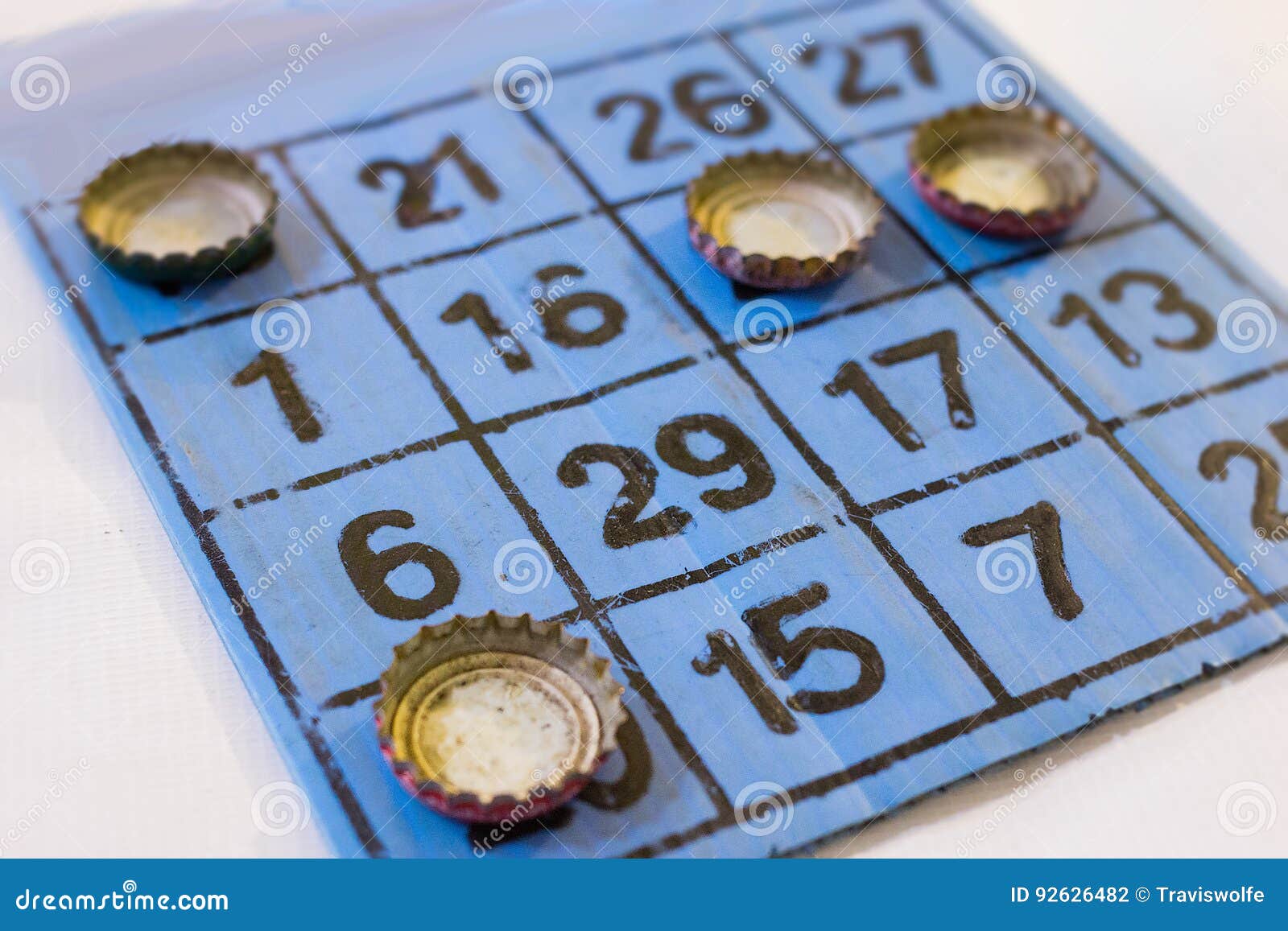 Bingo Played with Bottle Caps. Winners Board with No Skill or R Stock ...