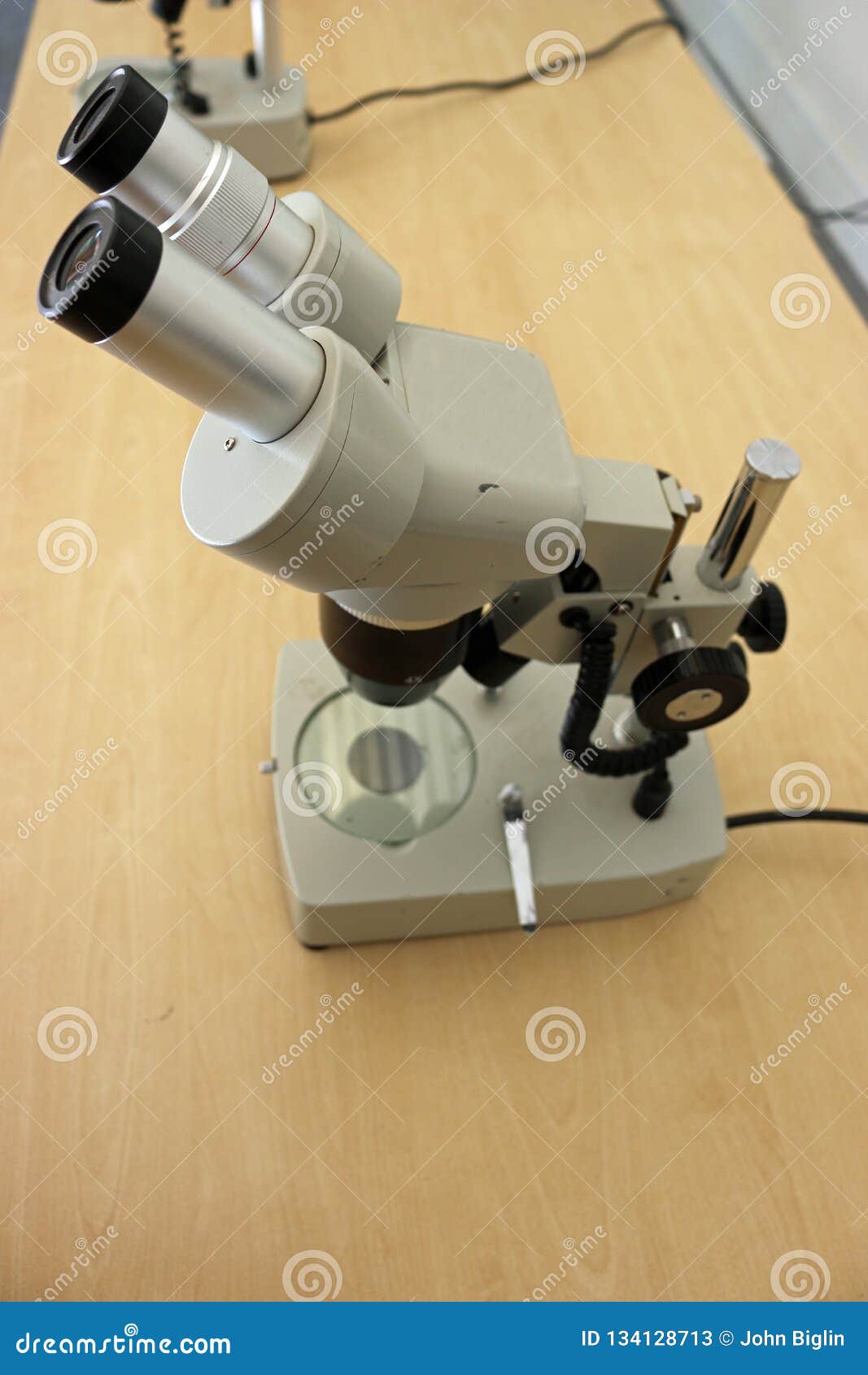 Binocular Microscope on Table Stock Image - Image of teaching, metal ...