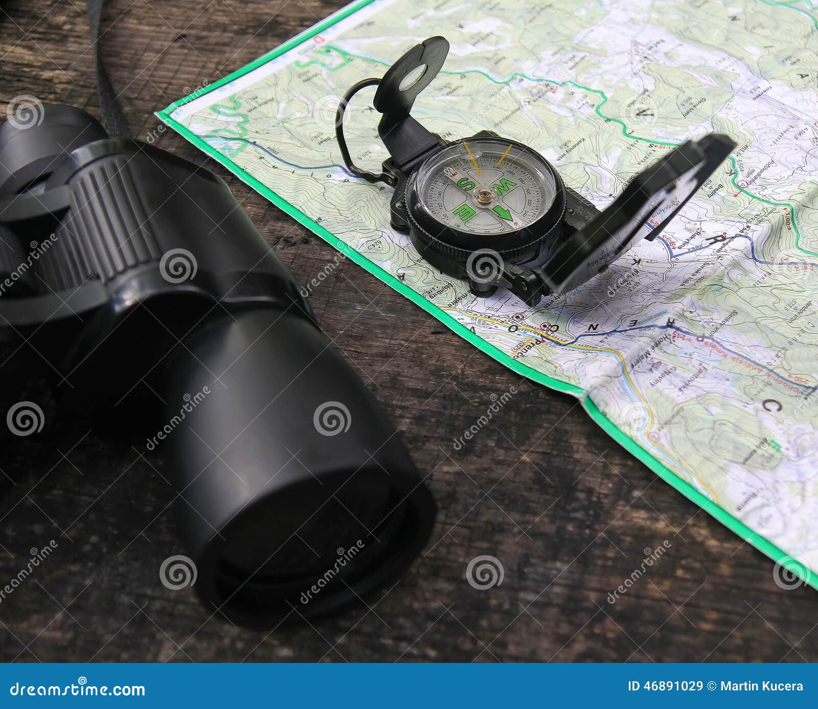 Binoculars and a Compass on the Map during Hiking. Stock Image - Image ...