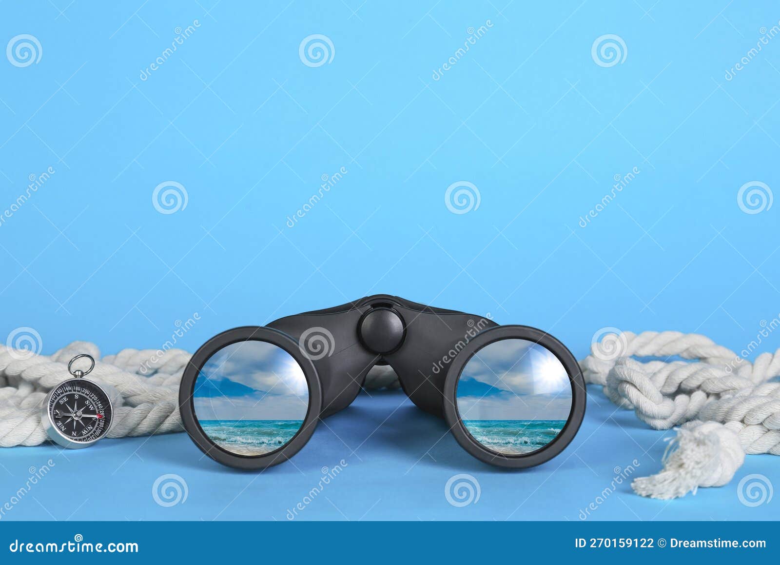 Binoculars, Compass and Rope on Light Blue Background. Seascape ...