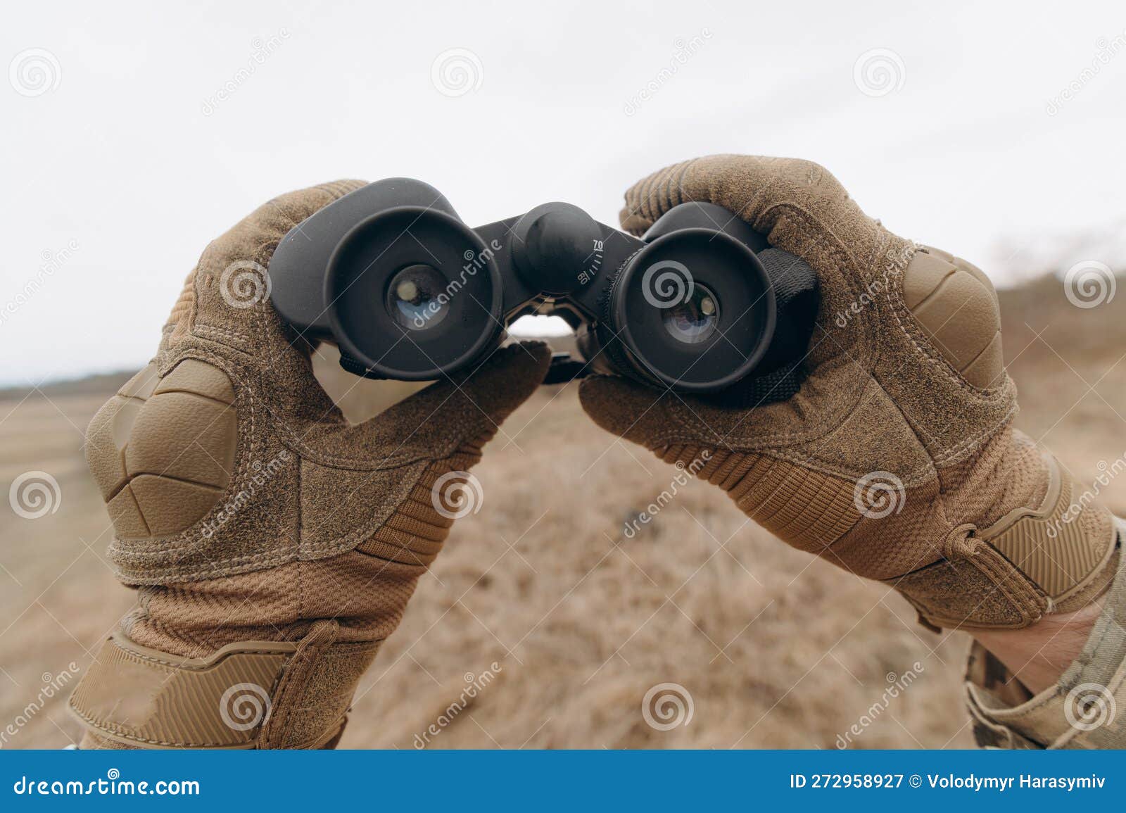 Binoculars in the Hands of a Soldier. Soldier Holding Binoculars in ...
