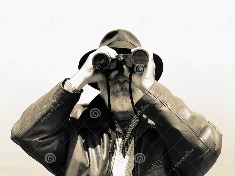 Binoculars - man explorer stock photo. Image of glass - 1070470