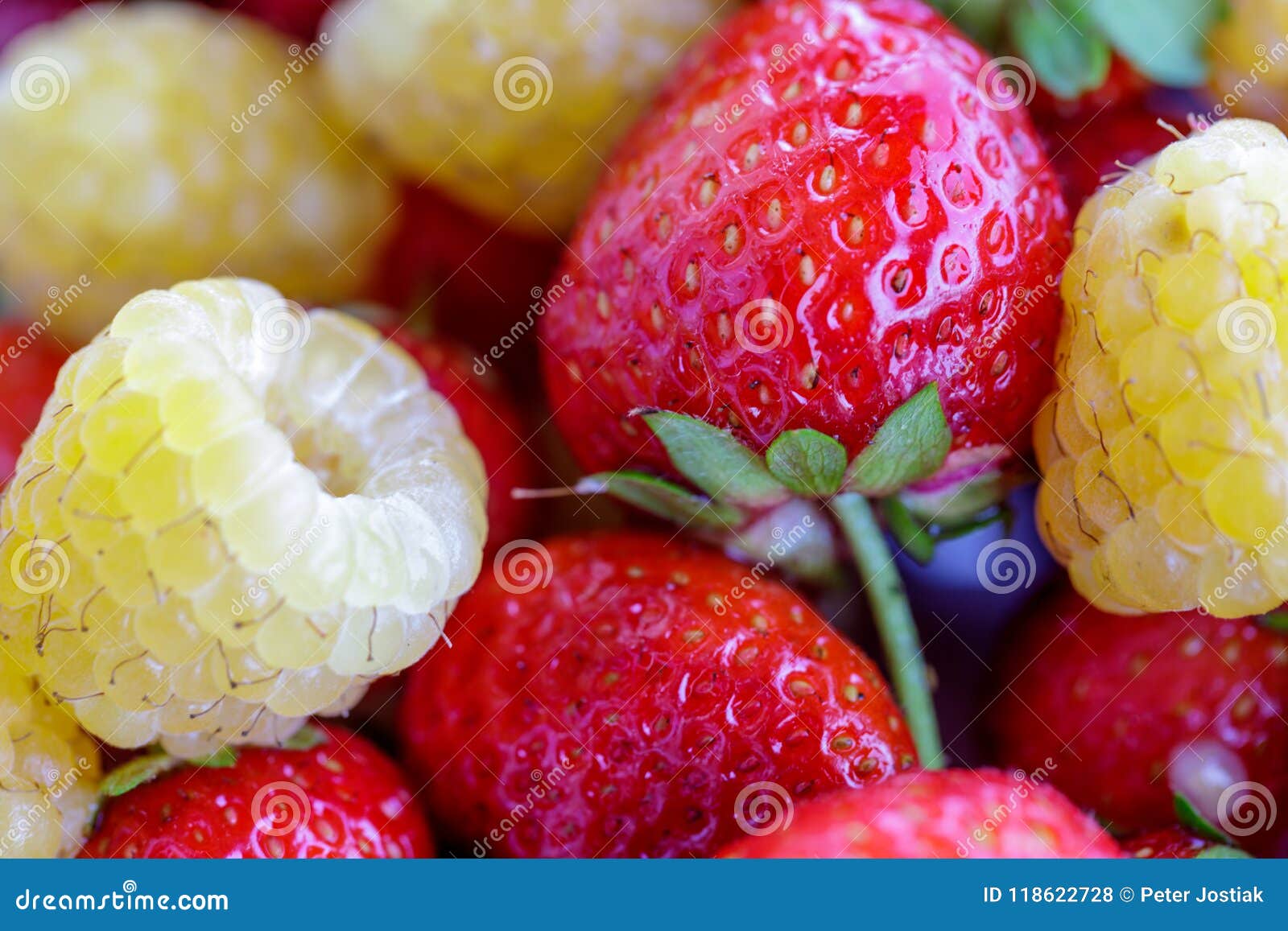 Bio Yellow Raspberries with Red Strawberries. Close Up Stock Photo ...