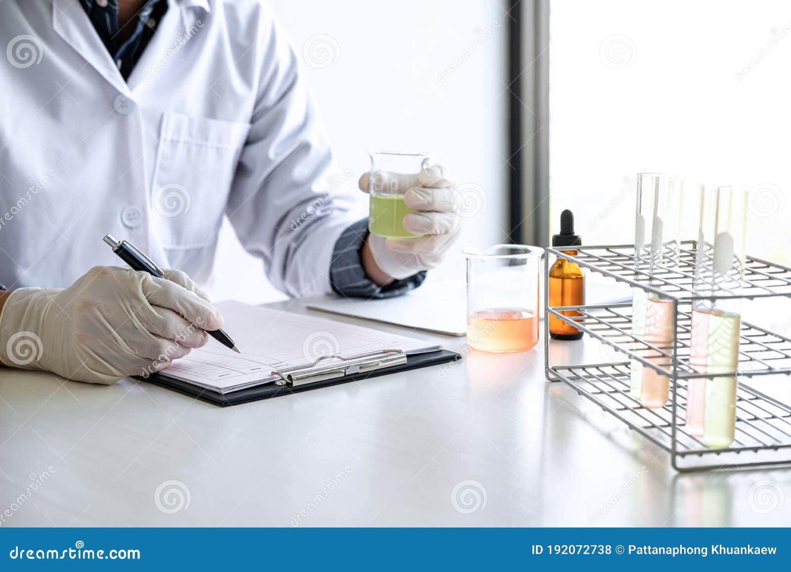 Biochemistry Laboratory Research, Chemist is Analyzing Sample in ...