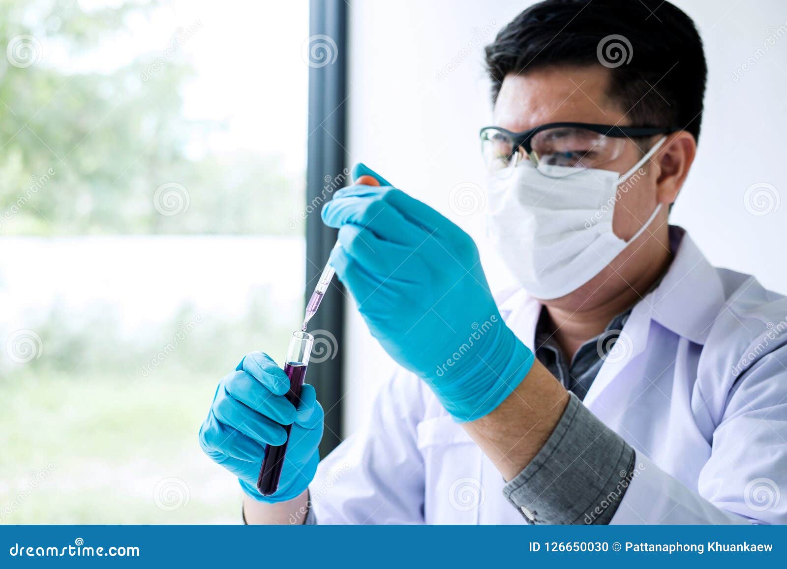 Biochemistry Laboratory Research, Chemist is Analyzing Sample in Stock ...