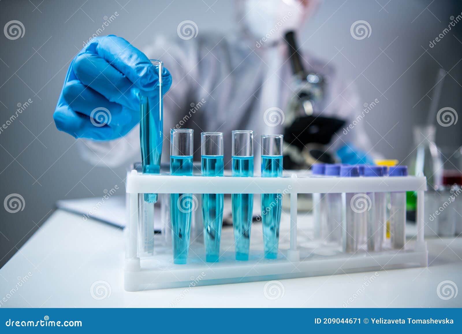 Biochemistry Laboratory Research, Chemist in Protective Suit Analyzing ...