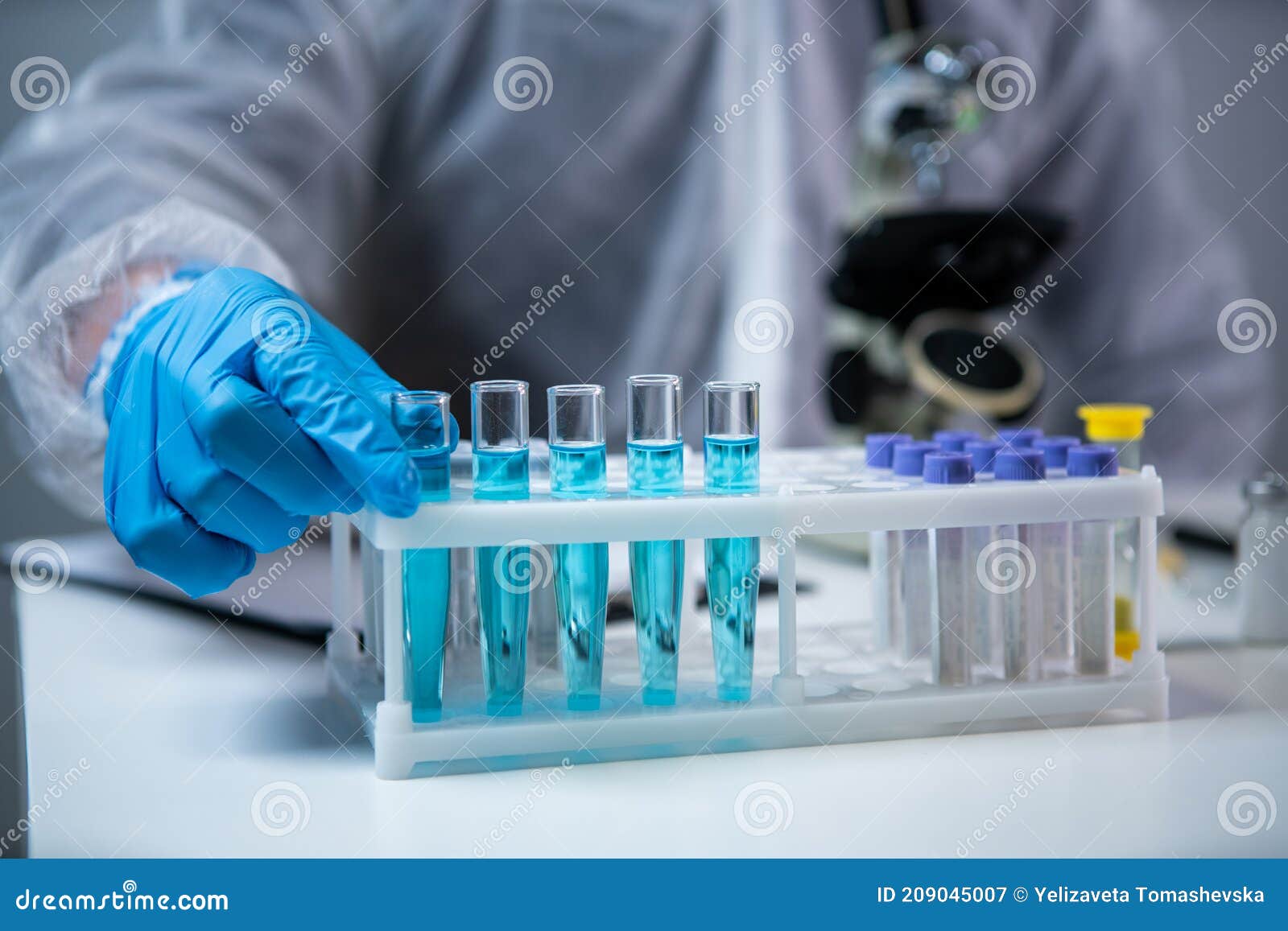 Biochemistry Laboratory Research, Chemist in Protective Suit Analyzing ...
