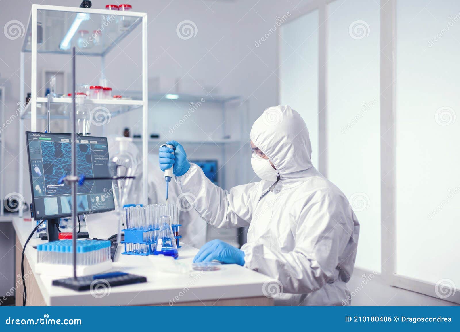 Biochemistry Scientist Taking Sample of Blue Solution Stock Photo ...