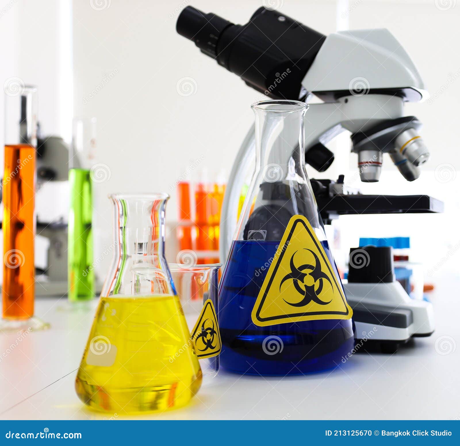 Biohazard Sing on Glass Beaker and Microscope in Laboratory Stock Photo ...
