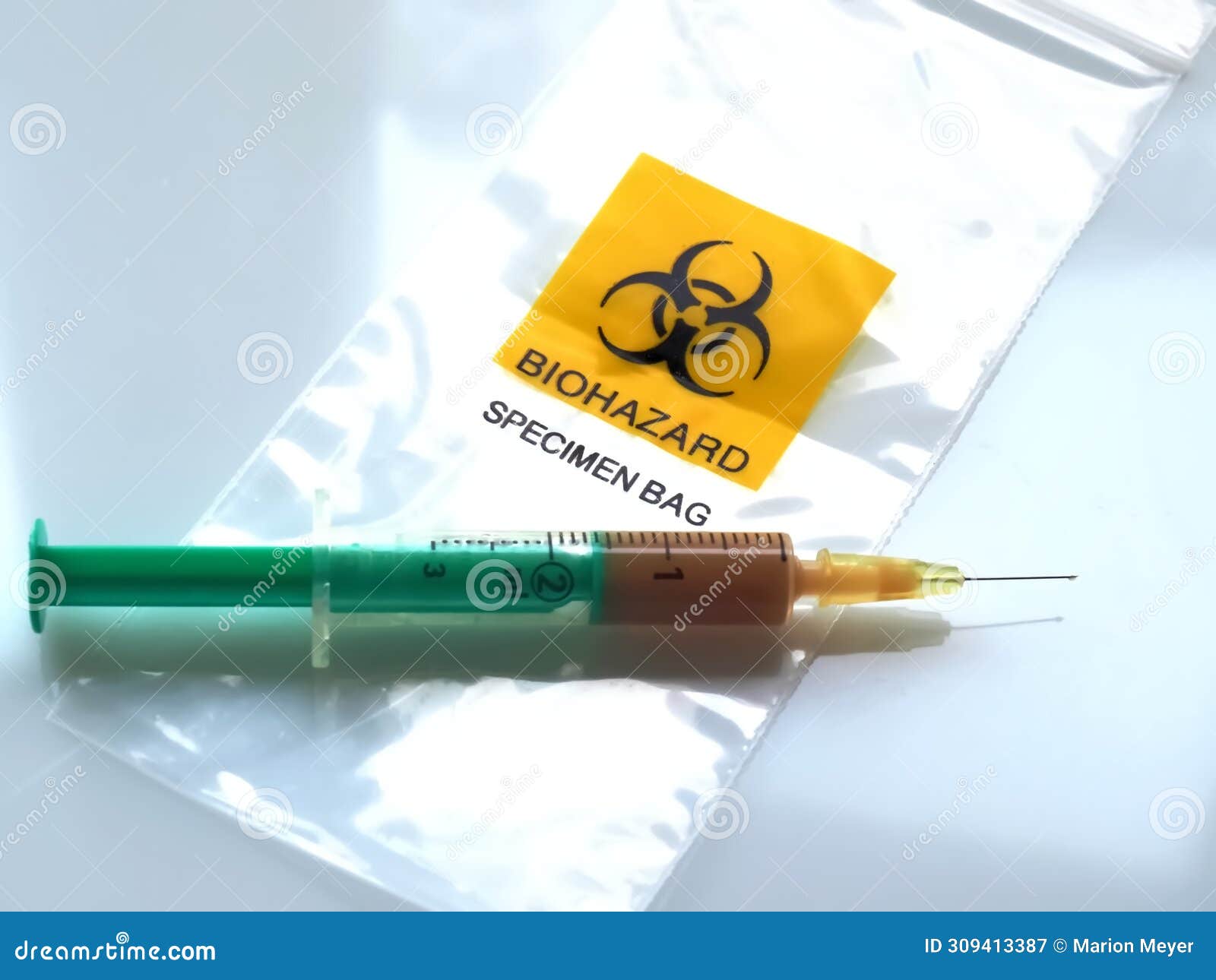 Biohazard Specimen Bag with a Syringe and Brown Liquid Stock Image ...
