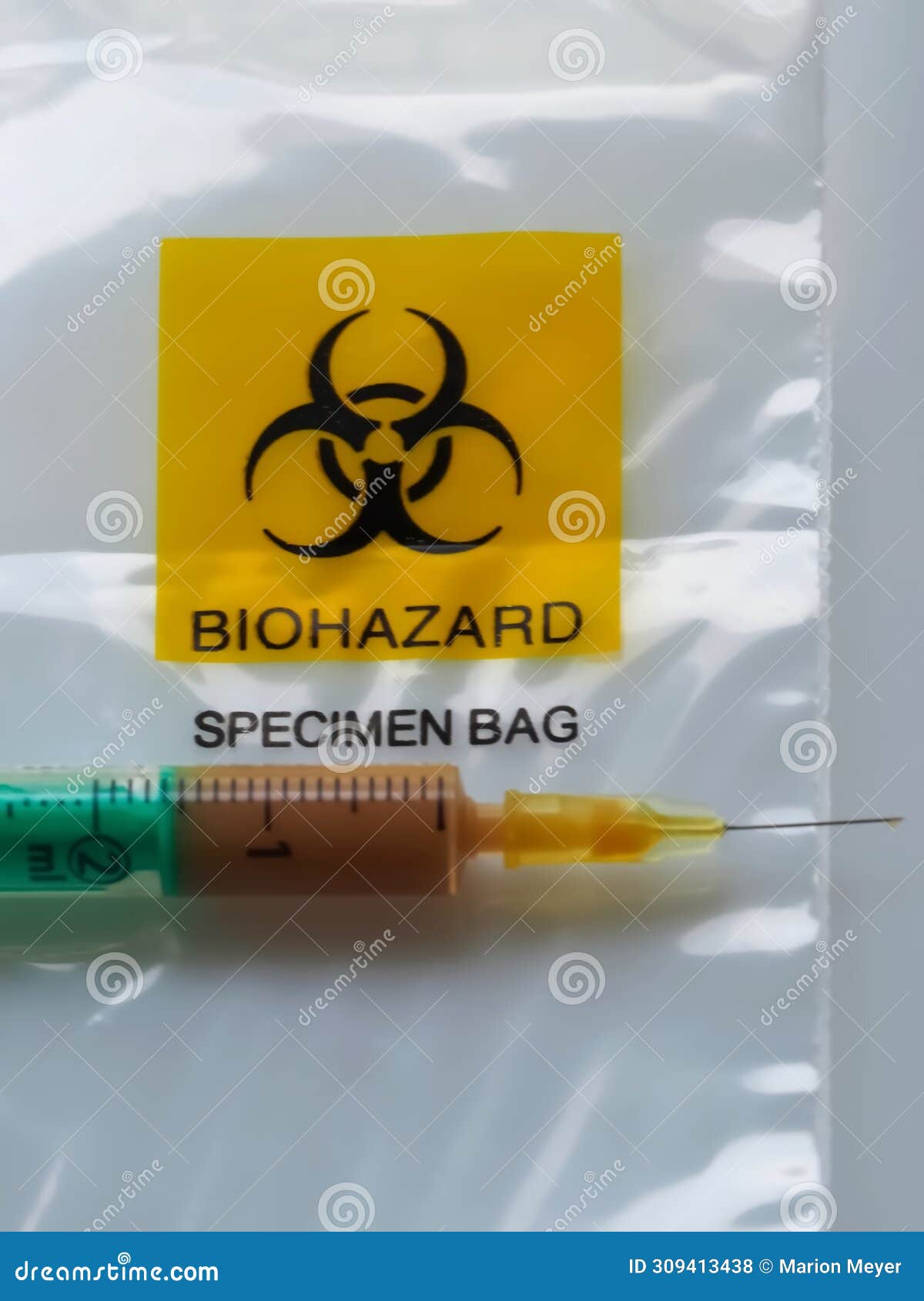 Biohazard Specimen Bag with a Syringe and Brown Liquid Stock Photo ...