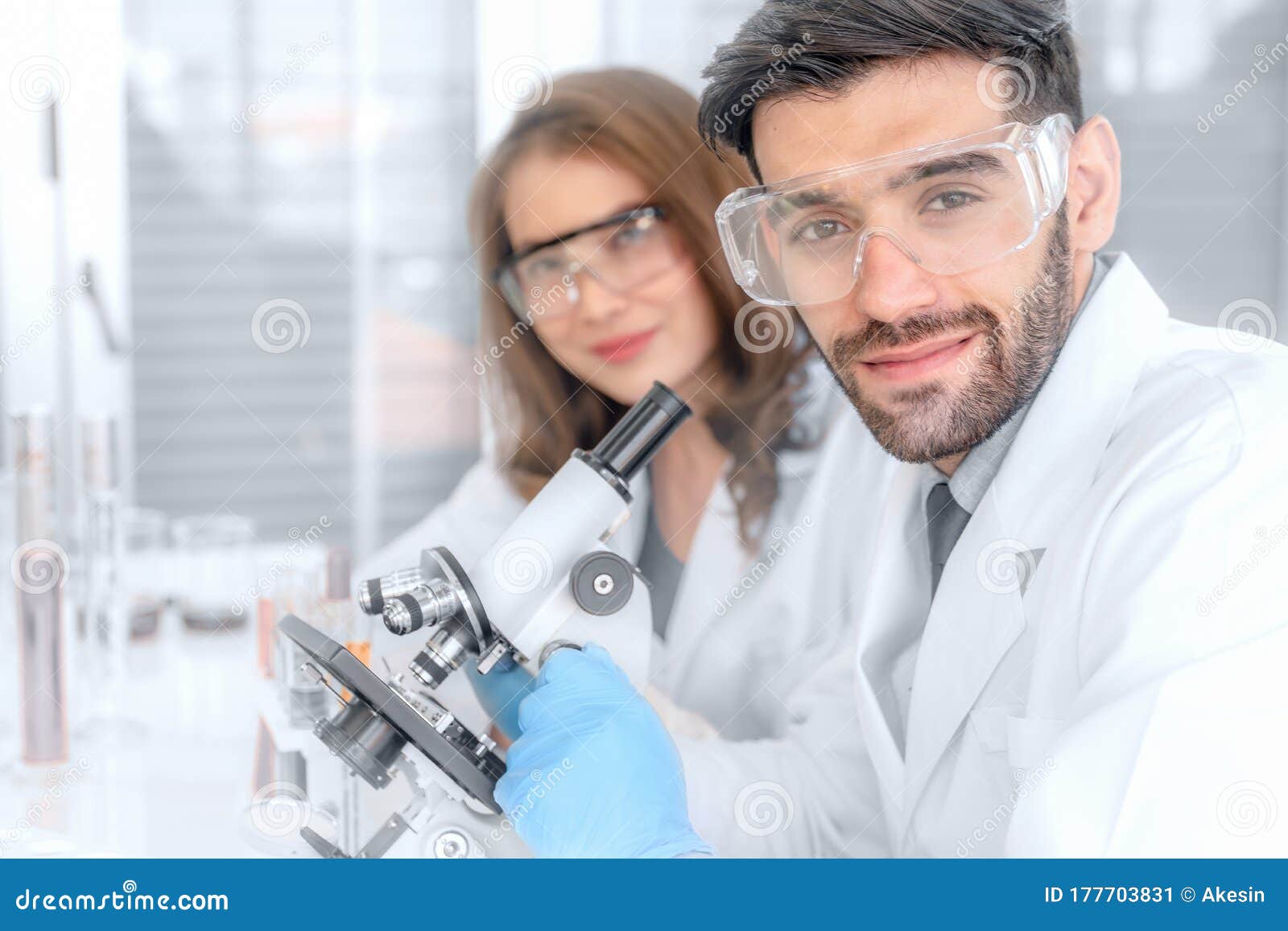 Biological Research Scientist Using Microscope in Laboratory Stock ...