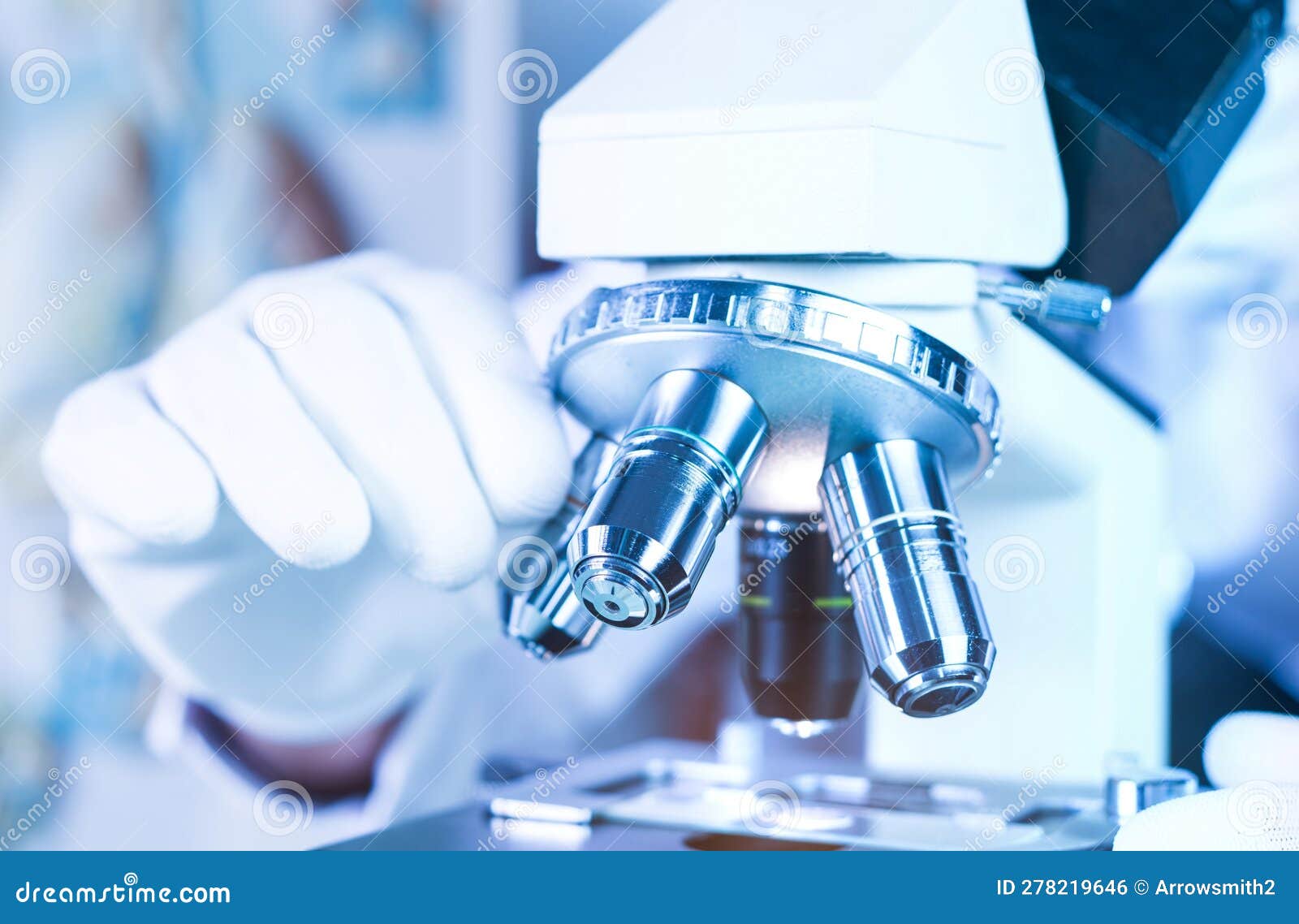 Biological Scientist Looking at Samples by Using Microscope Doing ...