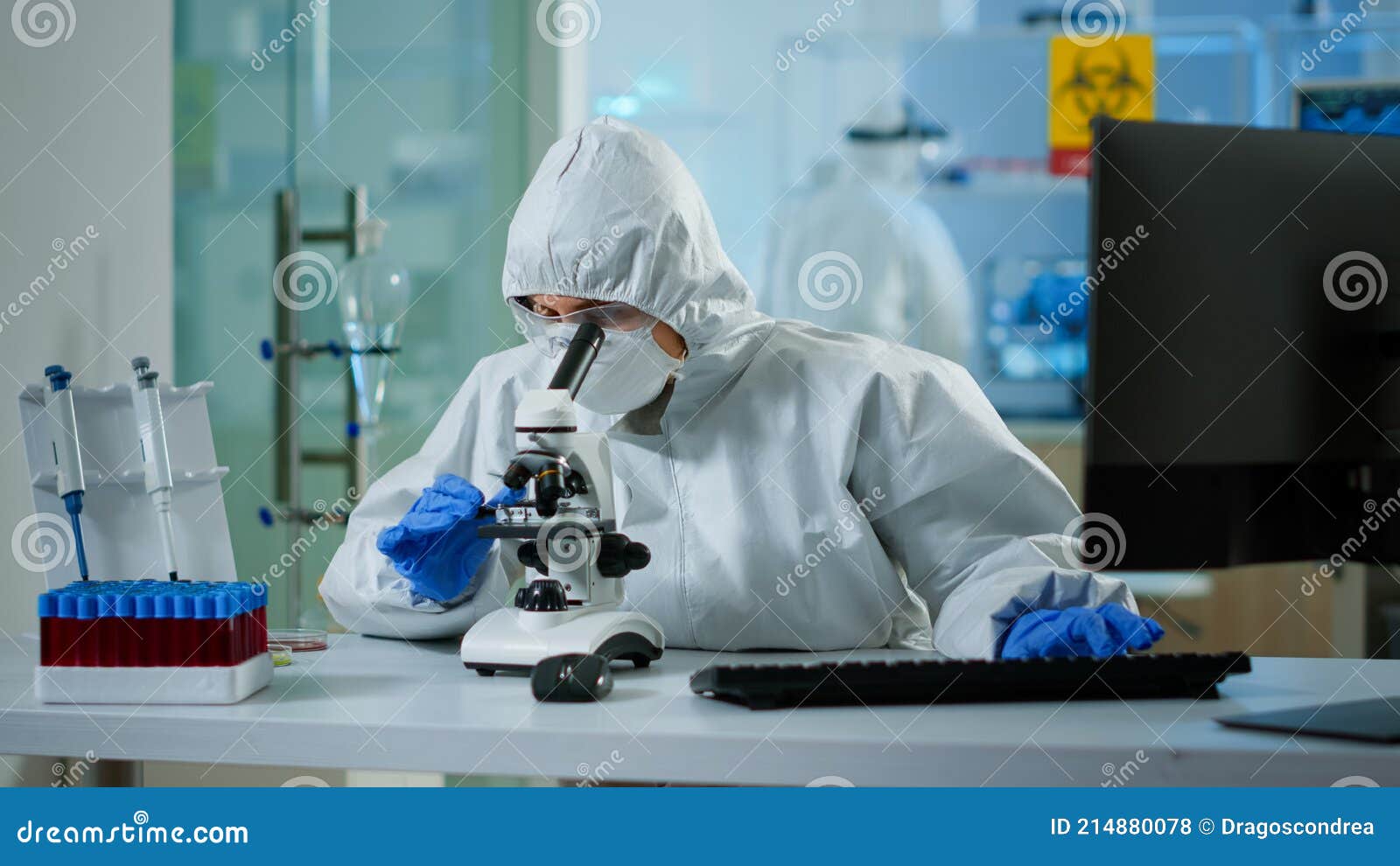 Biologist Doctor in Coverall Checking DNA Sample on Microscope Stock ...