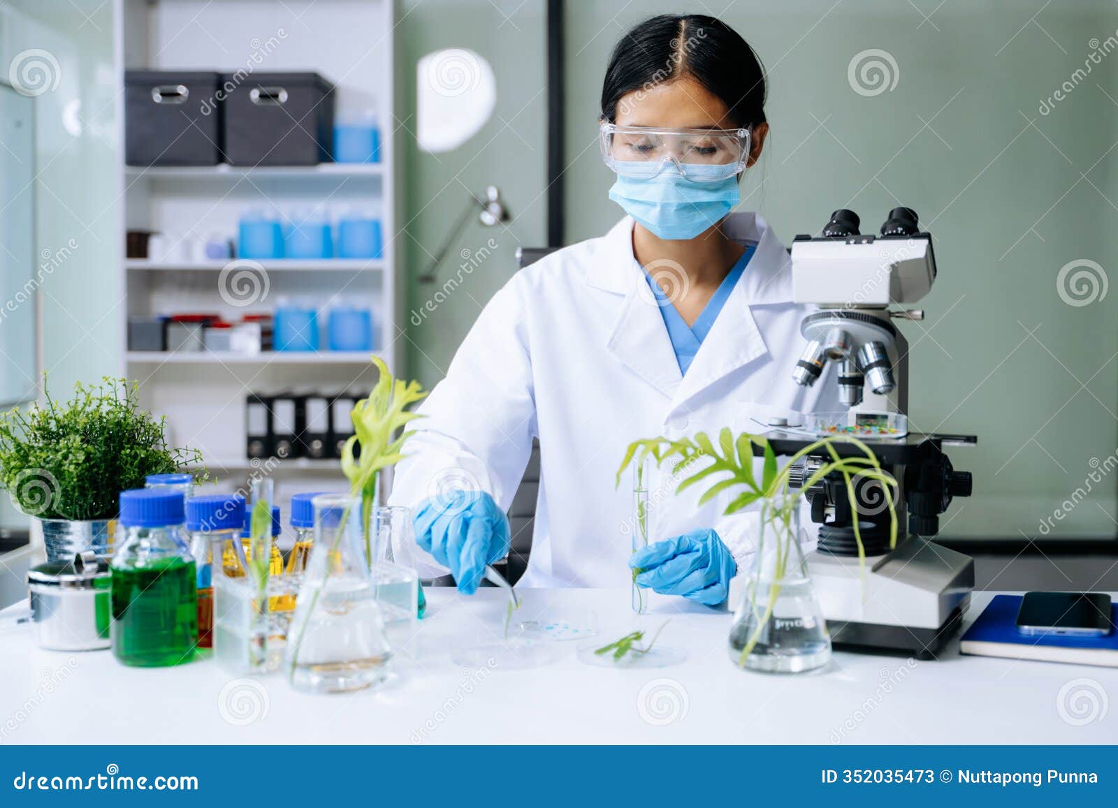 Biologist Taking Experiment with Plants Working in Biochemistry ...