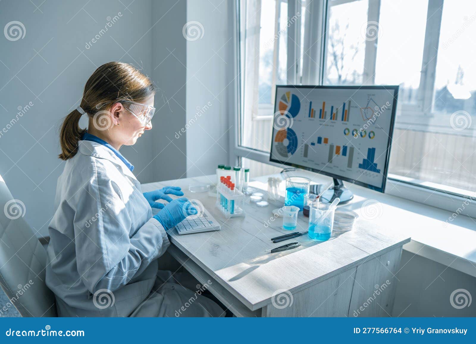 A Biologist Uses Computer Programs To Analyze Research in a Medical ...