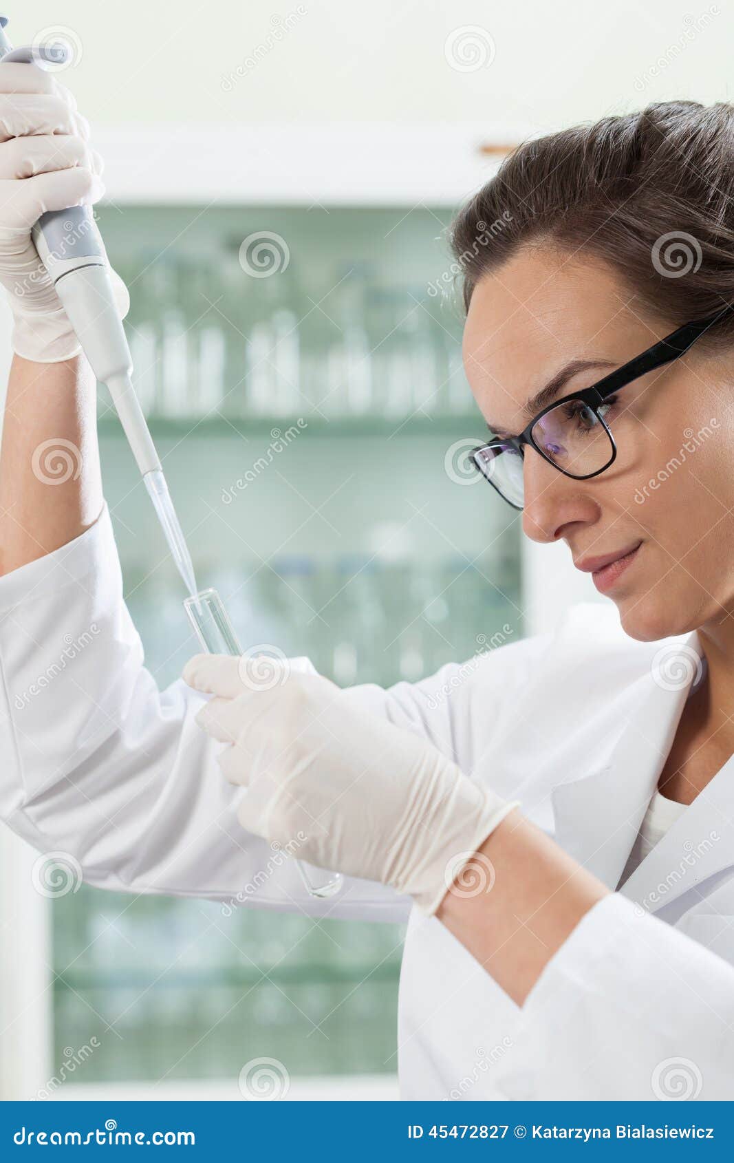Biologist using pipette stock image. Image of laboratory - 45472827